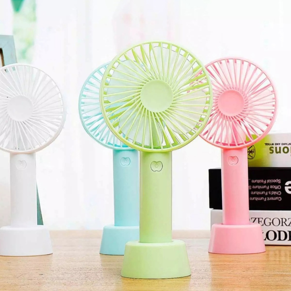 Portable mini rechargeable travel fan for indoor and outdoor use
